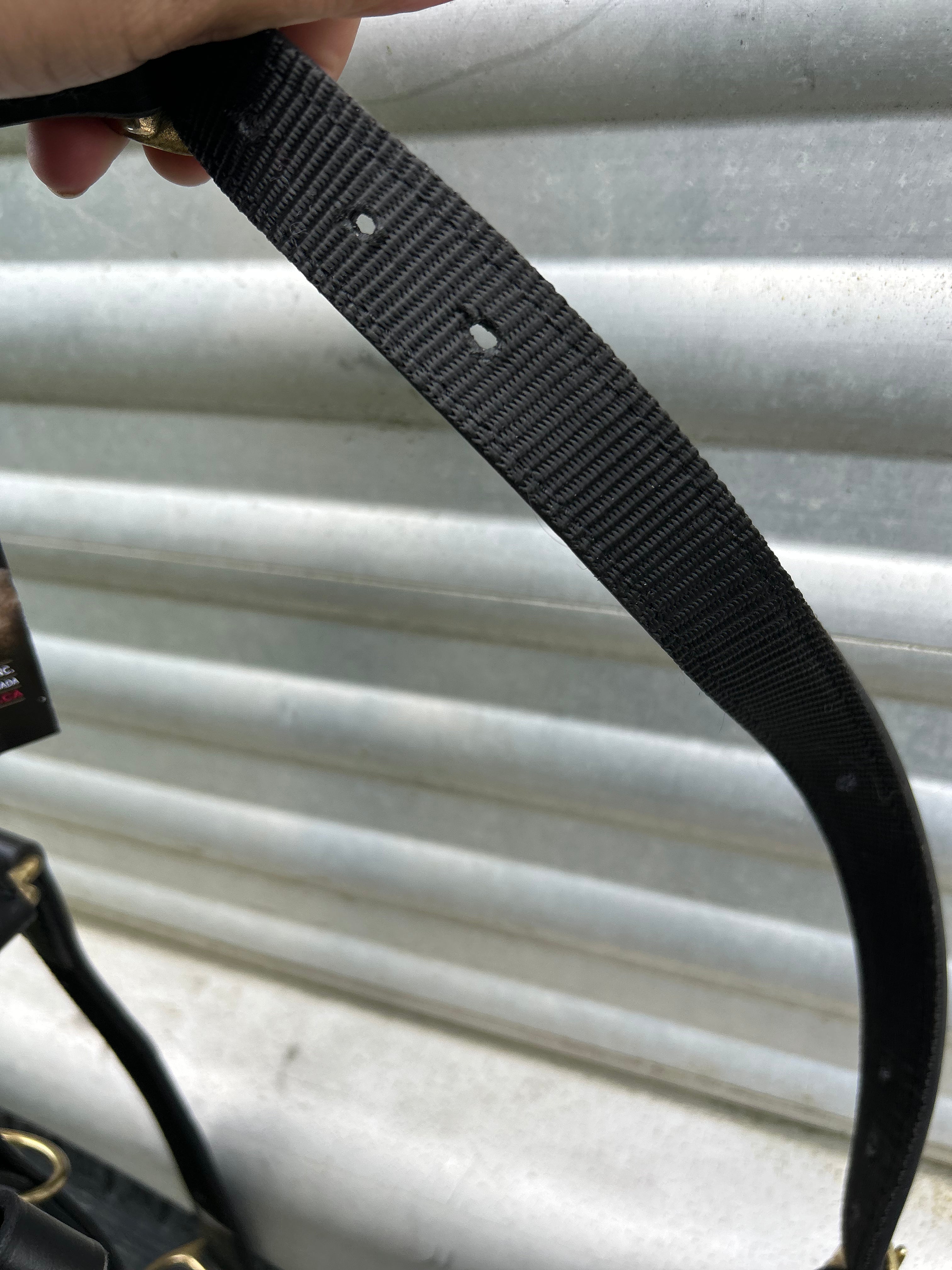 Ger Ryan Full size black leather halter with white stitching. Nylon li ...